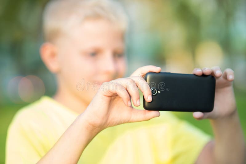 Boy Photographed on a Smartphone Stock Photo - Image of happy ...