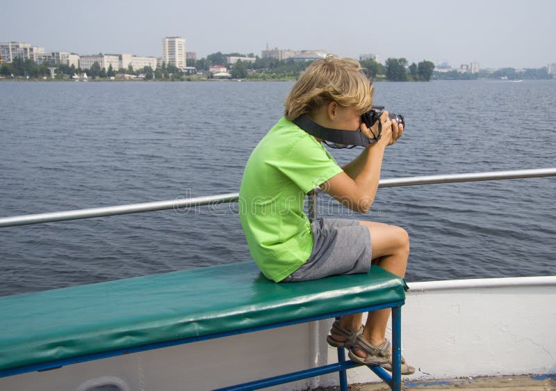 Boy Photographing on the Ship Stock Photo - Image of travelling, board ...