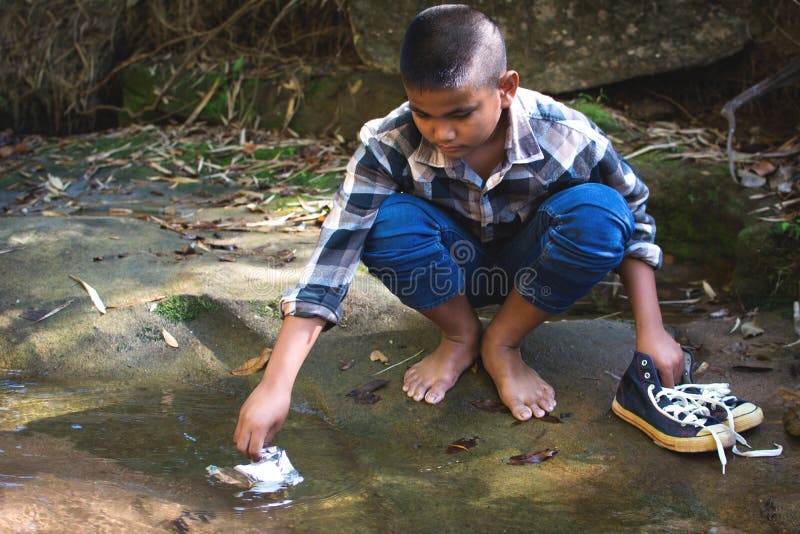 Boy Picking Up Plastic Garbage in Forest Stock Image - Image of hand ...