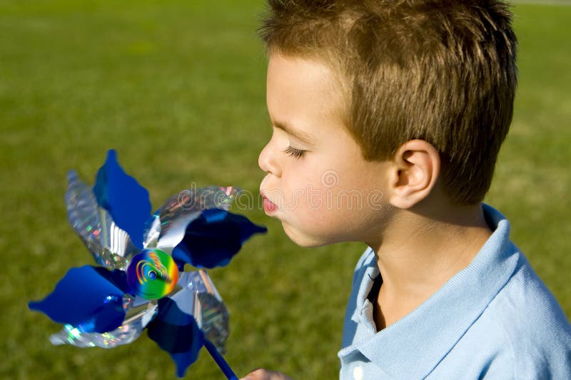 Boy pinwheel stock photo. Image of outside, handsome - 10232586