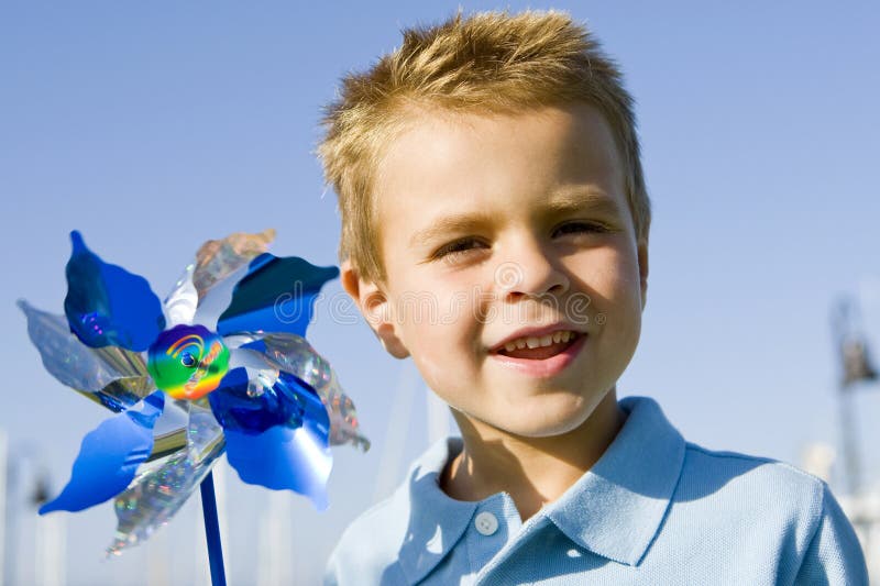 Boy pinwheel stock image. Image of family, male, beautiful - 10310053