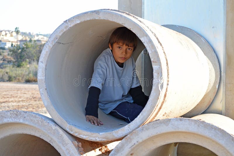 Boy in a Pipe - Sewer Drainage Drain Stock Photo - Image of drainage ...