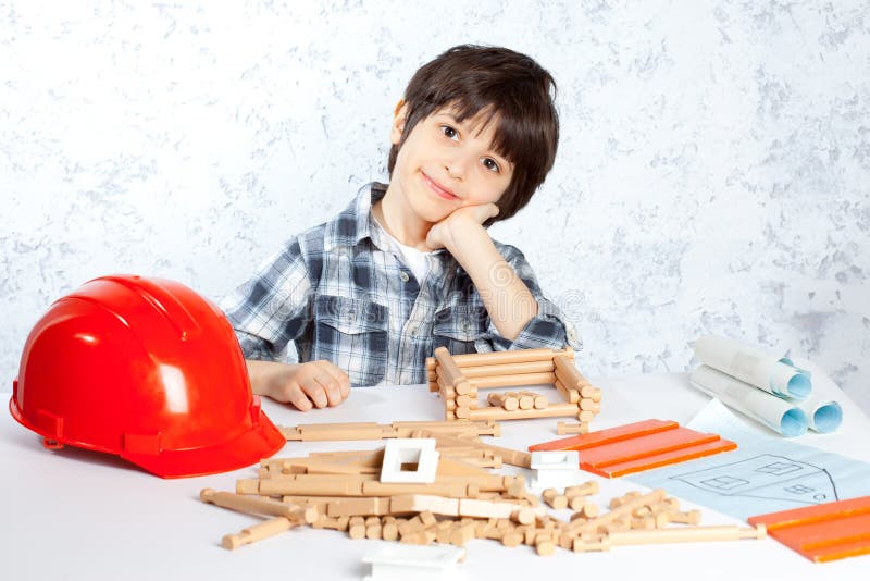 Boy plans to build a house stock image. Image of happiness - 39340295