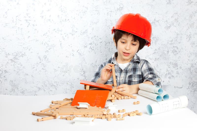 Boy plans to build a house stock image. Image of home - 42913523