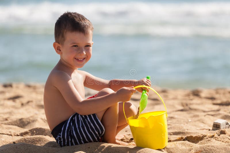 Boy Play with Sand on Summer Beach Stock Image - Image of sandcastle ...