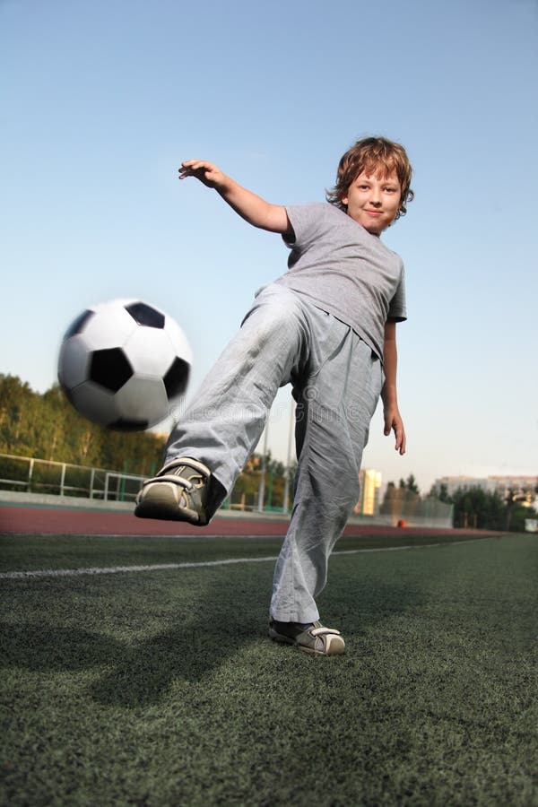 Boy Playing Soccer in the Park Stock Photo - Image of goal, activity ...