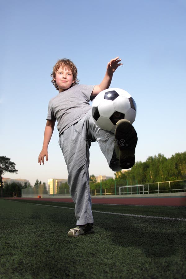 Boy play in soccer stock photo. Image of kick, outdoors - 26566188