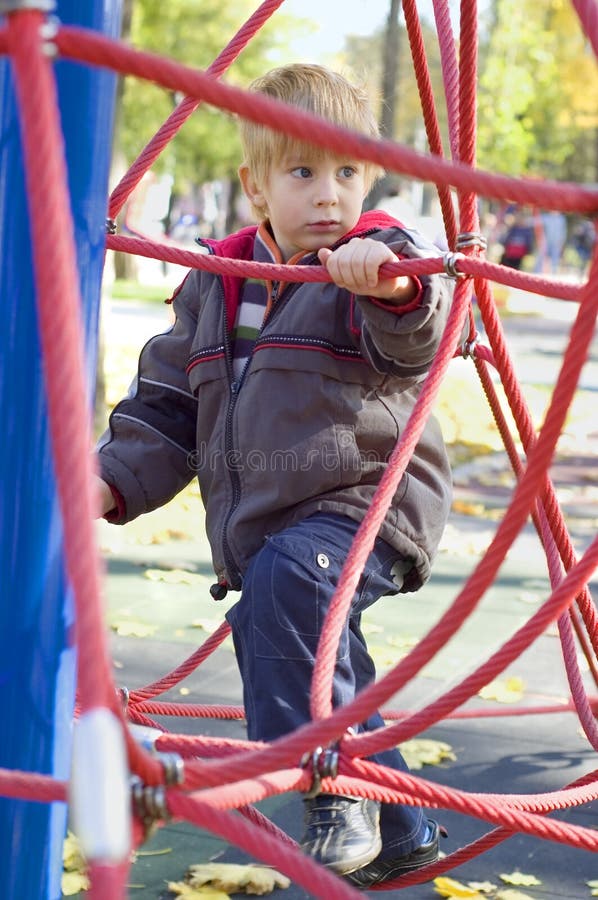 Boy on playground stock photo. Image of people, male - 12520216