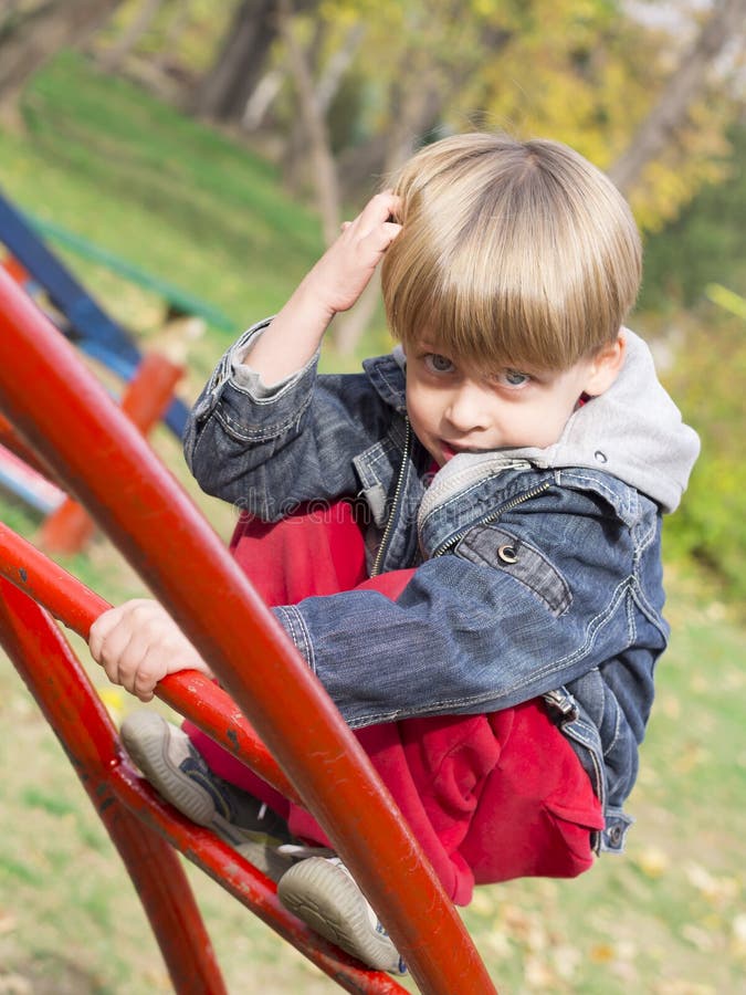 Boy at the playground stock image. Image of lifestyle - 27706869