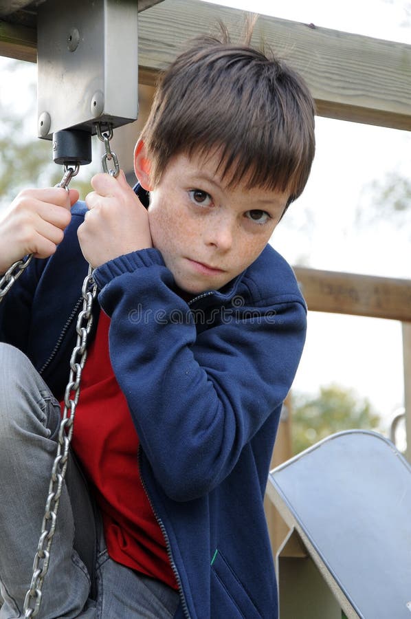 Boy at playground stock image. Image of joyful, fall - 47959525