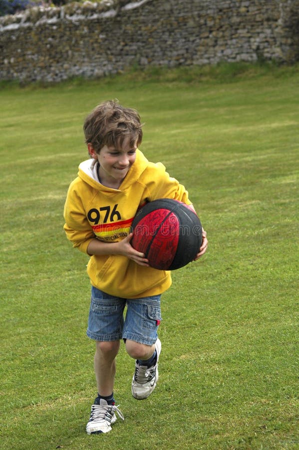 Boy playing with ball stock image. Image of holiday, fast - 6708031