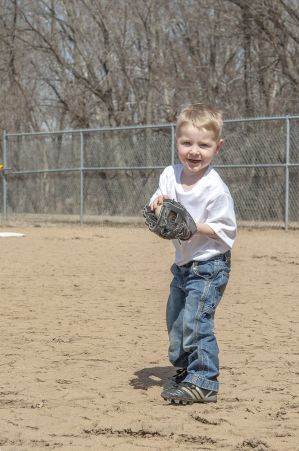 Young Boy Playing Catch with Ball and Glove Stock Image - Image of ...