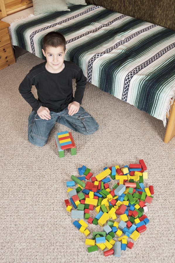 Boy Playing with Blocks Low View Stock Photo - Image of games, crowded ...