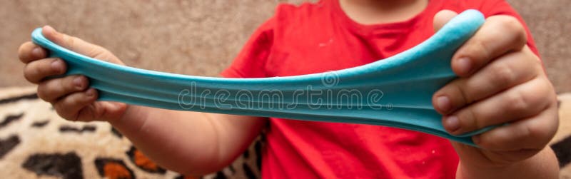 The Boy is Playing with a Blue Slime Stock Photo - Image of summer ...