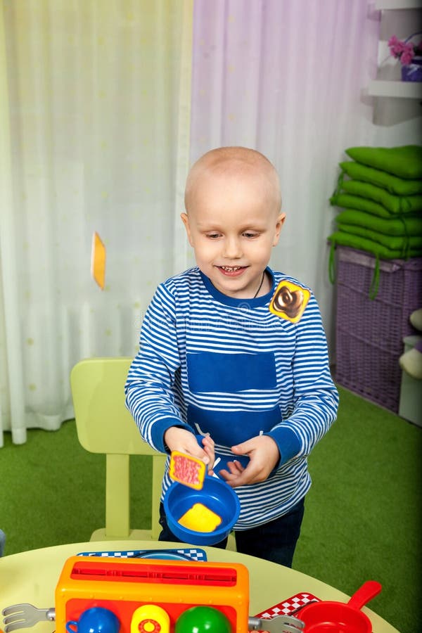 Boy playing a board game stock photo. Image of chip - 112821430