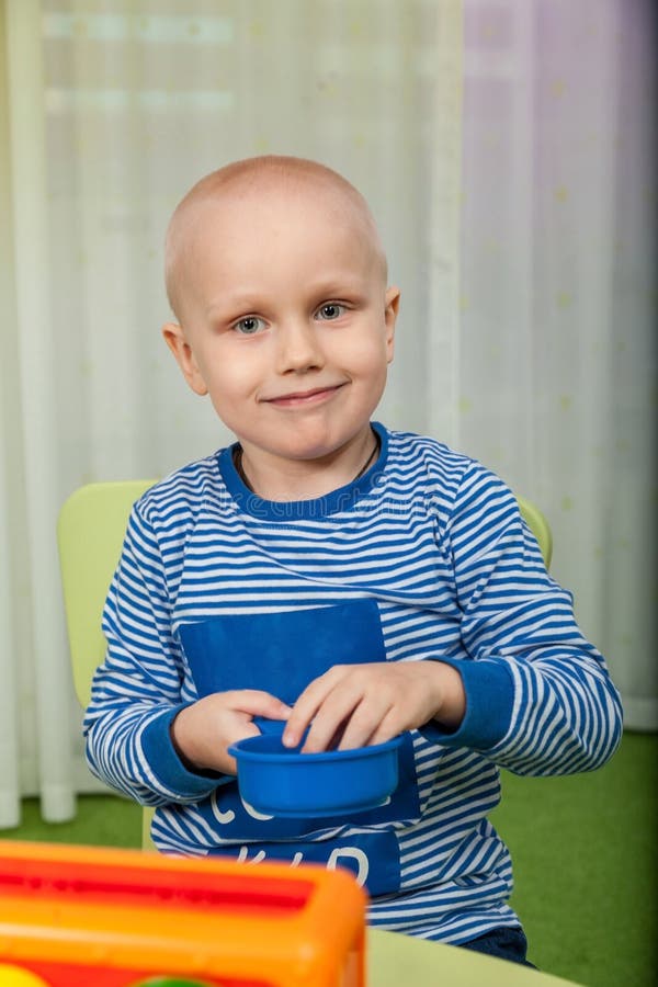 Boy playing a board game stock photo. Image of leisure - 112890582