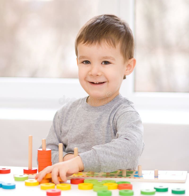 Boy is Playing with Building Blocks Stock Image - Image of funny ...