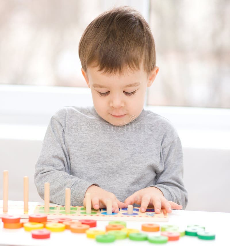 Boy is Playing with Building Blocks Stock Photo - Image of blocks, cute ...