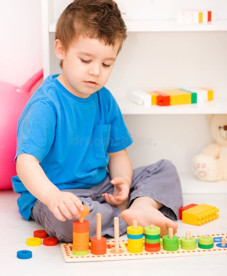 Boy is Playing with Building Blocks Stock Photo - Image of human ...