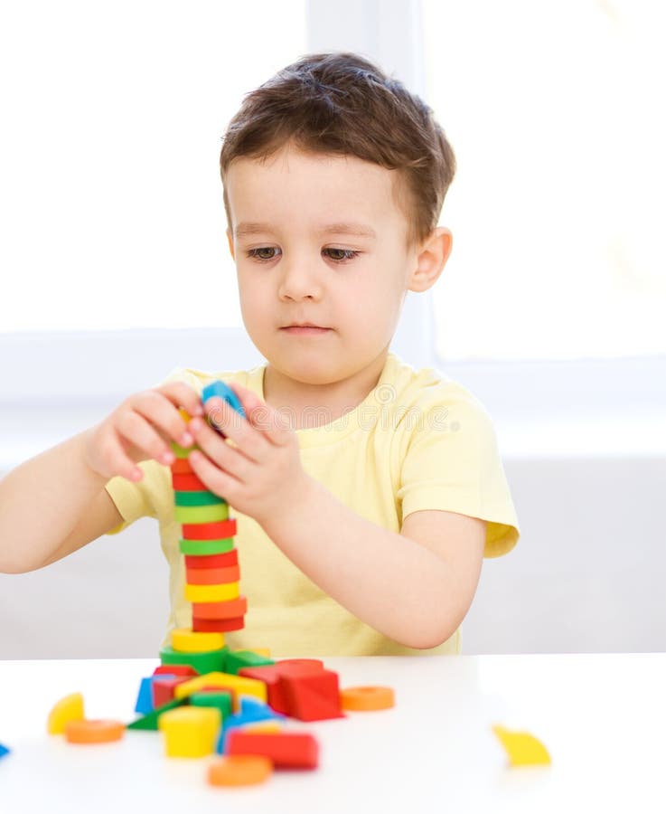 Boy is Playing with Building Blocks Stock Image - Image of child ...