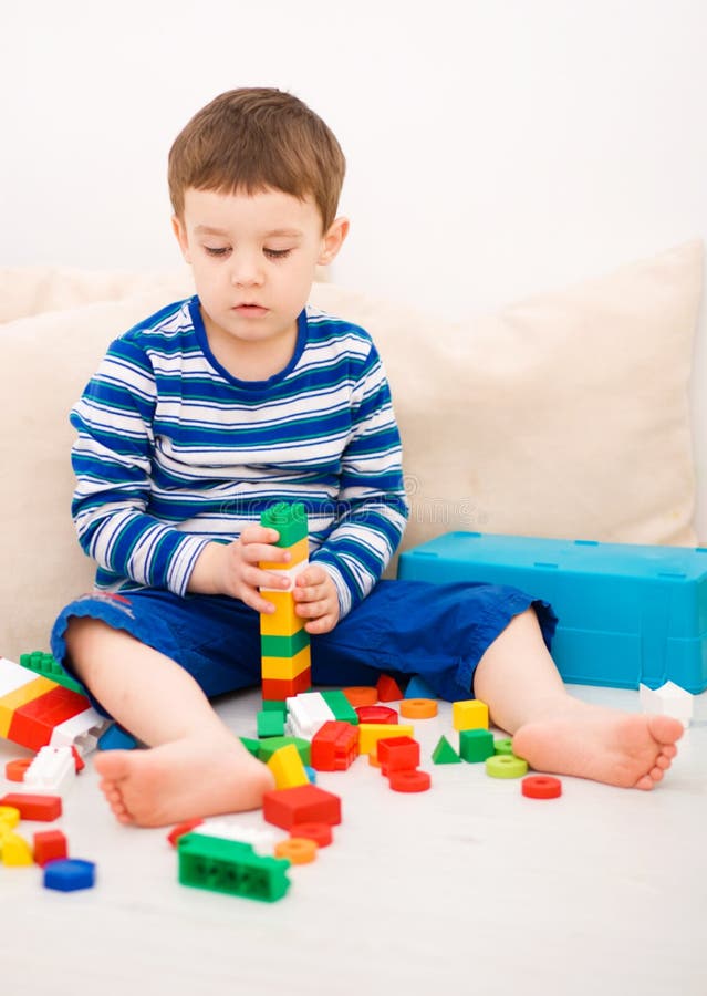 Boy is Playing with Building Blocks Stock Image - Image of playing ...