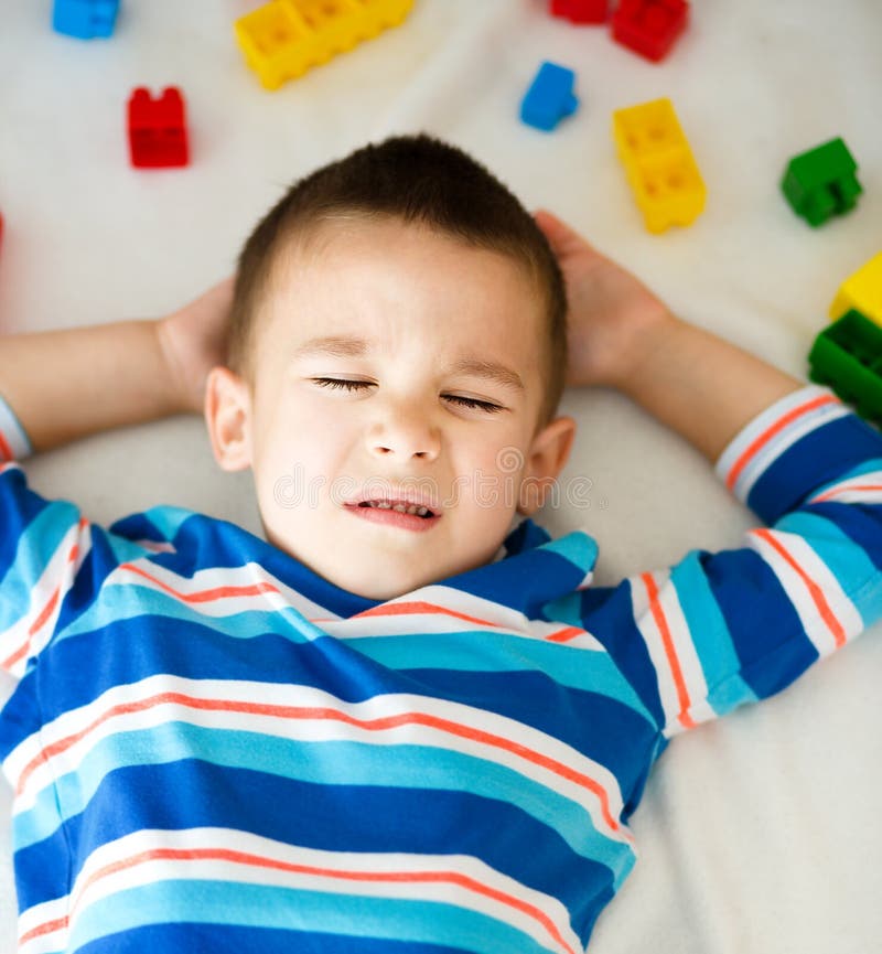 Boy is Playing with Building Blocks Stock Photo - Image of indoors ...