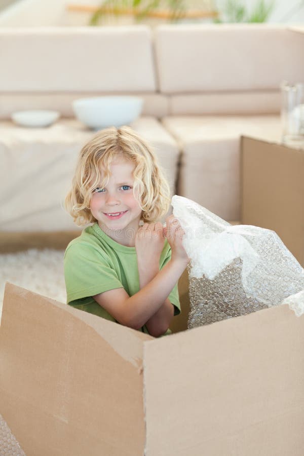 Boy Playing with Cardboard Box Stock Photo - Image of child, adorable ...