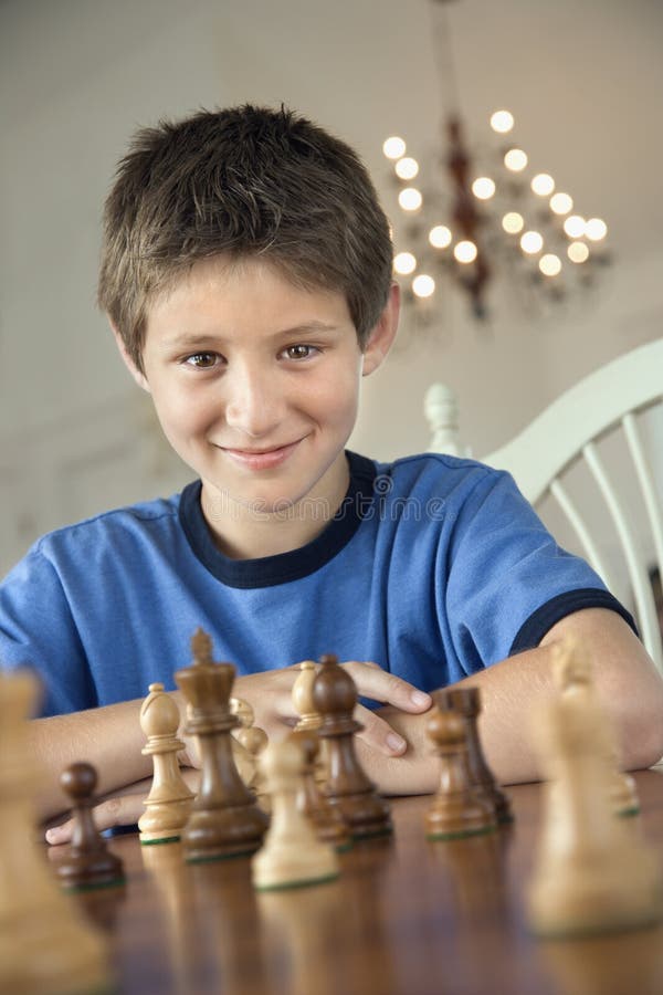 Boy playing chess. stock photo. Image of child, photograph - 2046084