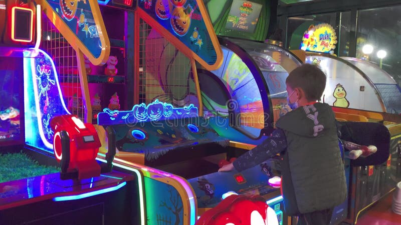 Little Boy Playing on Tablet while Lying Down. Watch Cartoons Stock ...