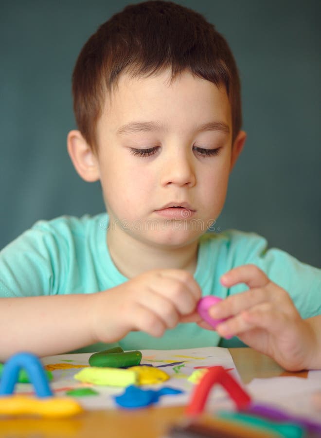 Boy Playing with Color Play Dough Stock Photo - Image of crayon ...