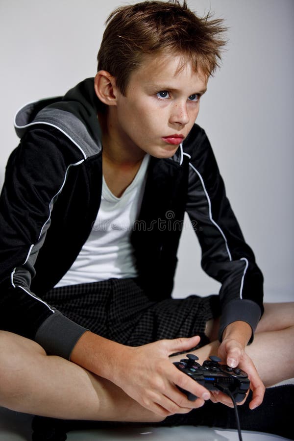 Boy Playing Video Game stock image. Image of mood, scowl - 1007523