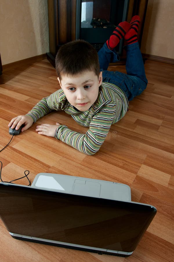 Boy playing computer game stock image. Image of childhood - 13412995