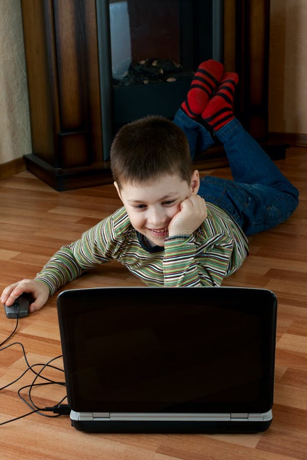 Boy playing computer game stock image. Image of humor - 13481703
