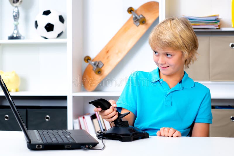 Boy is Playing Computer Game Stock Photo - Image of laptop, education ...