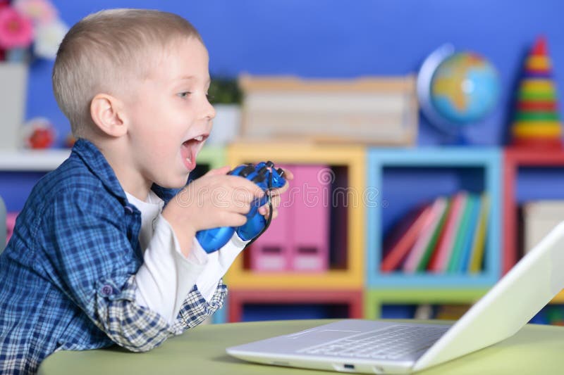 Boy Playing a Computer Game Stock Image - Image of people, excited ...