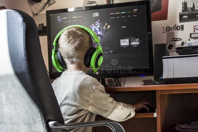 Boy playing computer stock photo. Image of gambling, game - 44945060