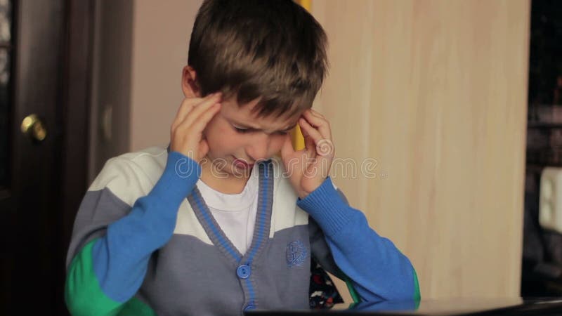 The Boy is Playing on the Computer in Virtual Reality Glasses in the ...