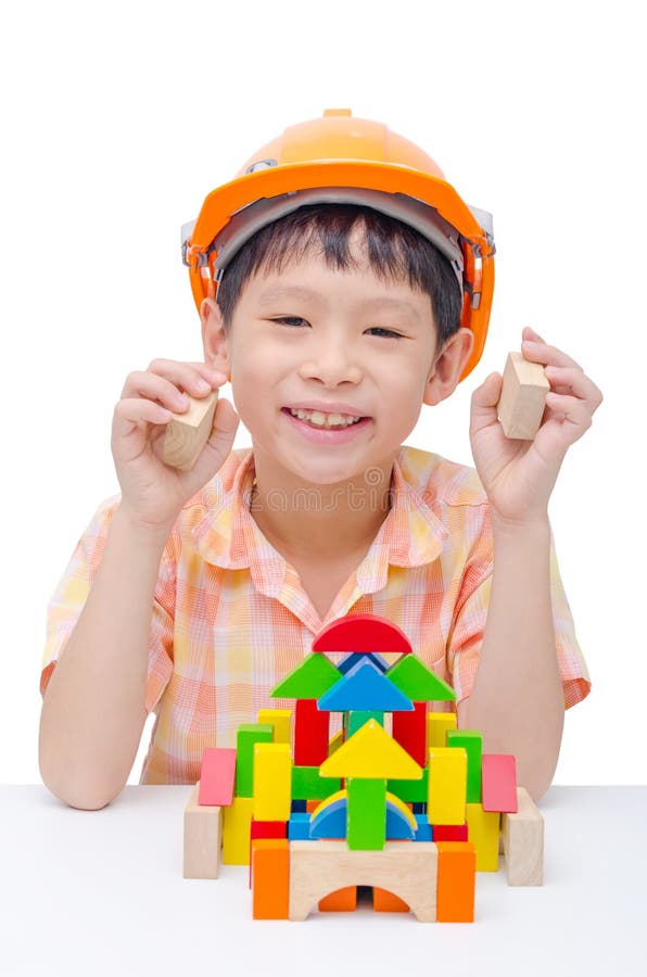 Boy Playing Construction Blocks Stock Photo - Image of brick, helmet ...