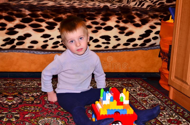 Boy playing constructor stock photo. Image of built, playing - 69996636