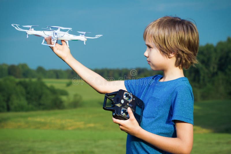 Boy Playing with Drone Outdoors. Stock Photo - Image of park, hobby ...
