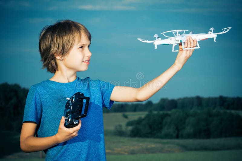 Boy Playing with Drone Outdoors. Stock Image - Image of hobby ...
