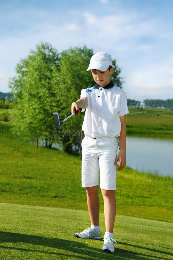 Boy playing golf stock image. Image of practice, green - 61268733