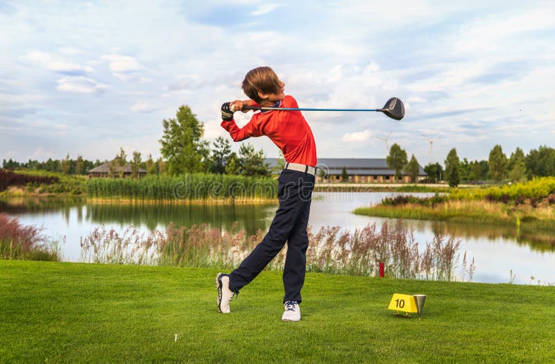 Boy playing golf stock image. Image of golf, golfer - 122904515