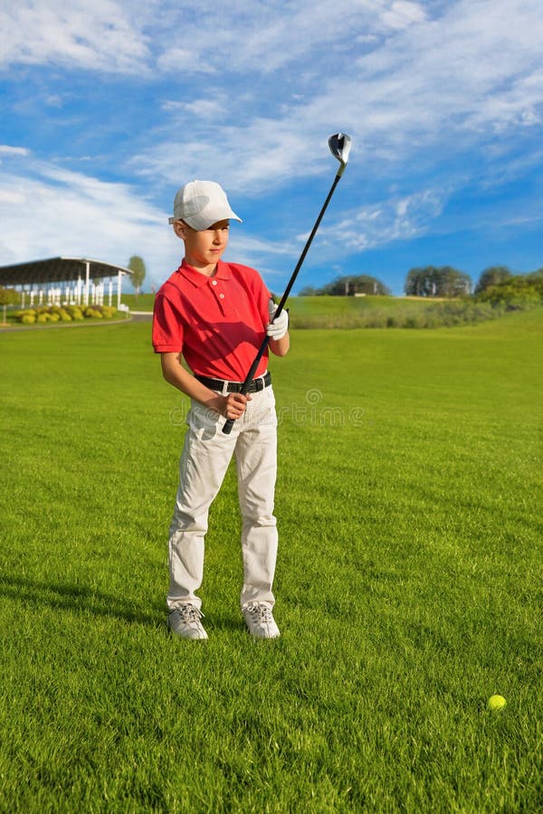 Boy playing golf stock photo. Image of iron, energy, fairway - 58012112