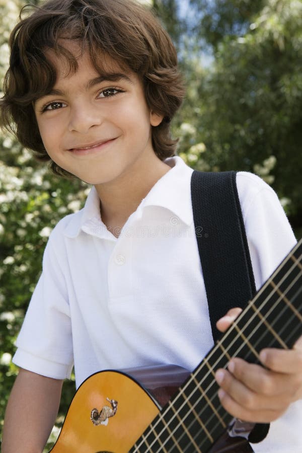 Boy Playing Guitar stock image. Image of leisure, music - 29662503