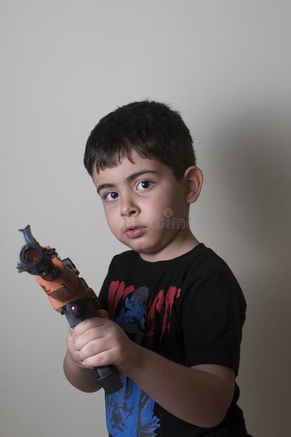 Boy playing with gun stock image. Image of play, iraq - 61407457