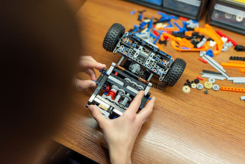 Boy Playing with Hi-tech Constructor, Making Complex Machine with Many ...
