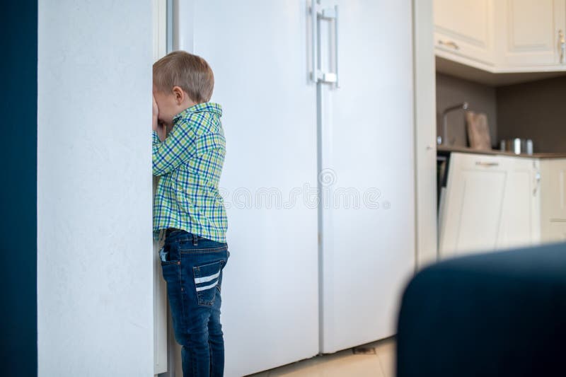Boy Playing Hide and Sick in the Kitchen Stock Image - Image of modern ...