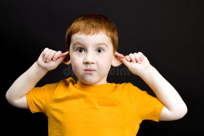 Happy Little Boy Pulling Ears Stock Photos - Free & Royalty-Free Stock ...