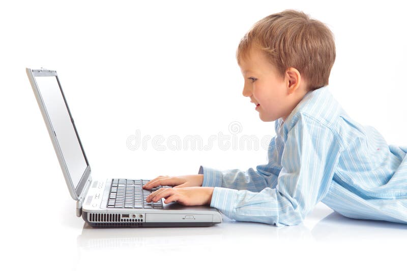 Boy playing on laptop stock photo. Image of youth, learning - 2686102